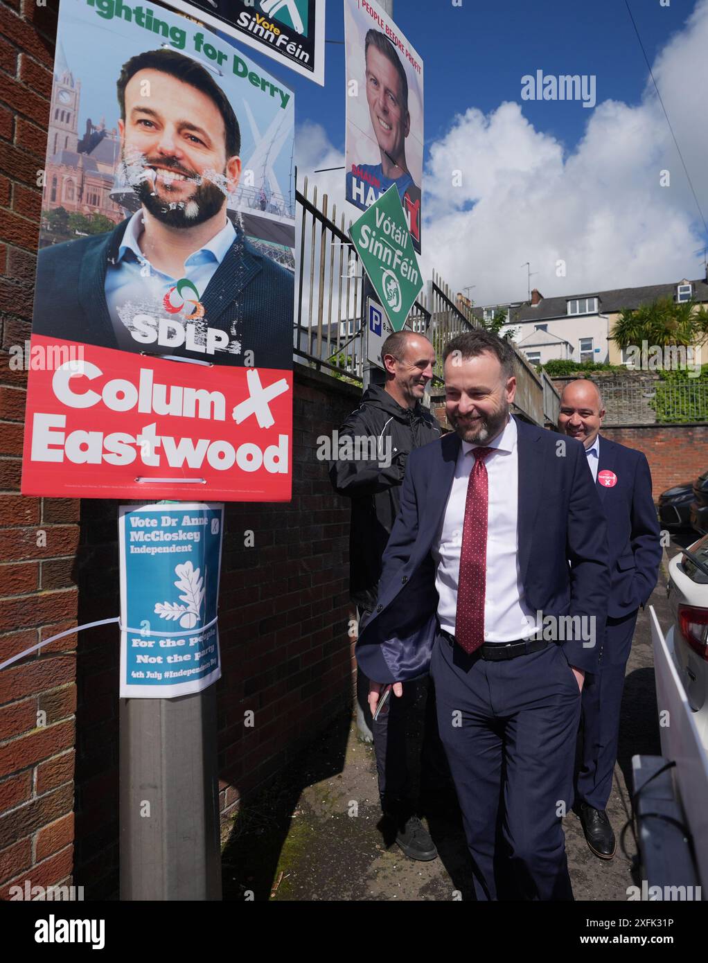 SDLP leader Colum Eastwood arrives to cast his vote in the 2024 General ...