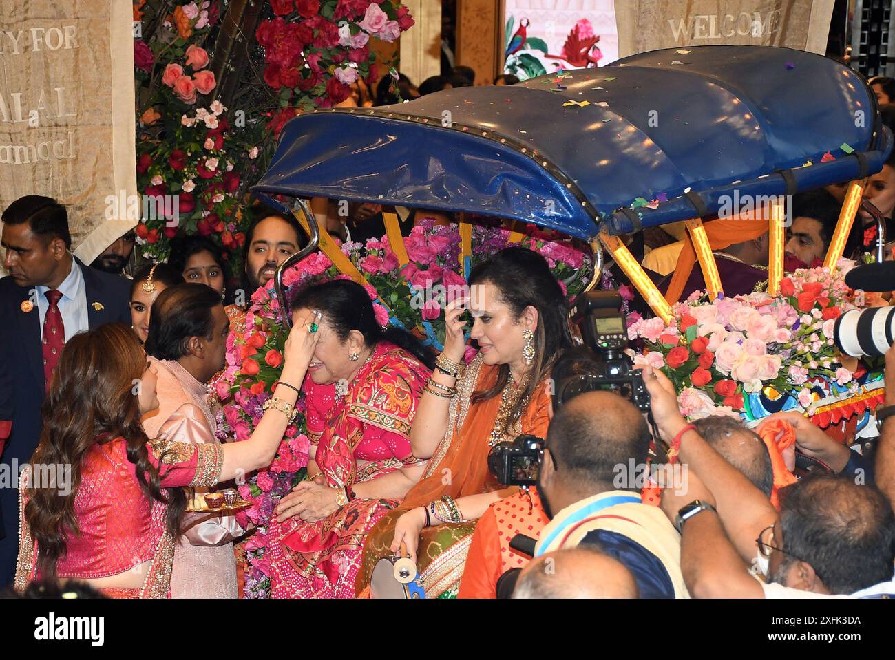 Indian philanthropist and business woman Nita Ambani (L) welcomes her ...
