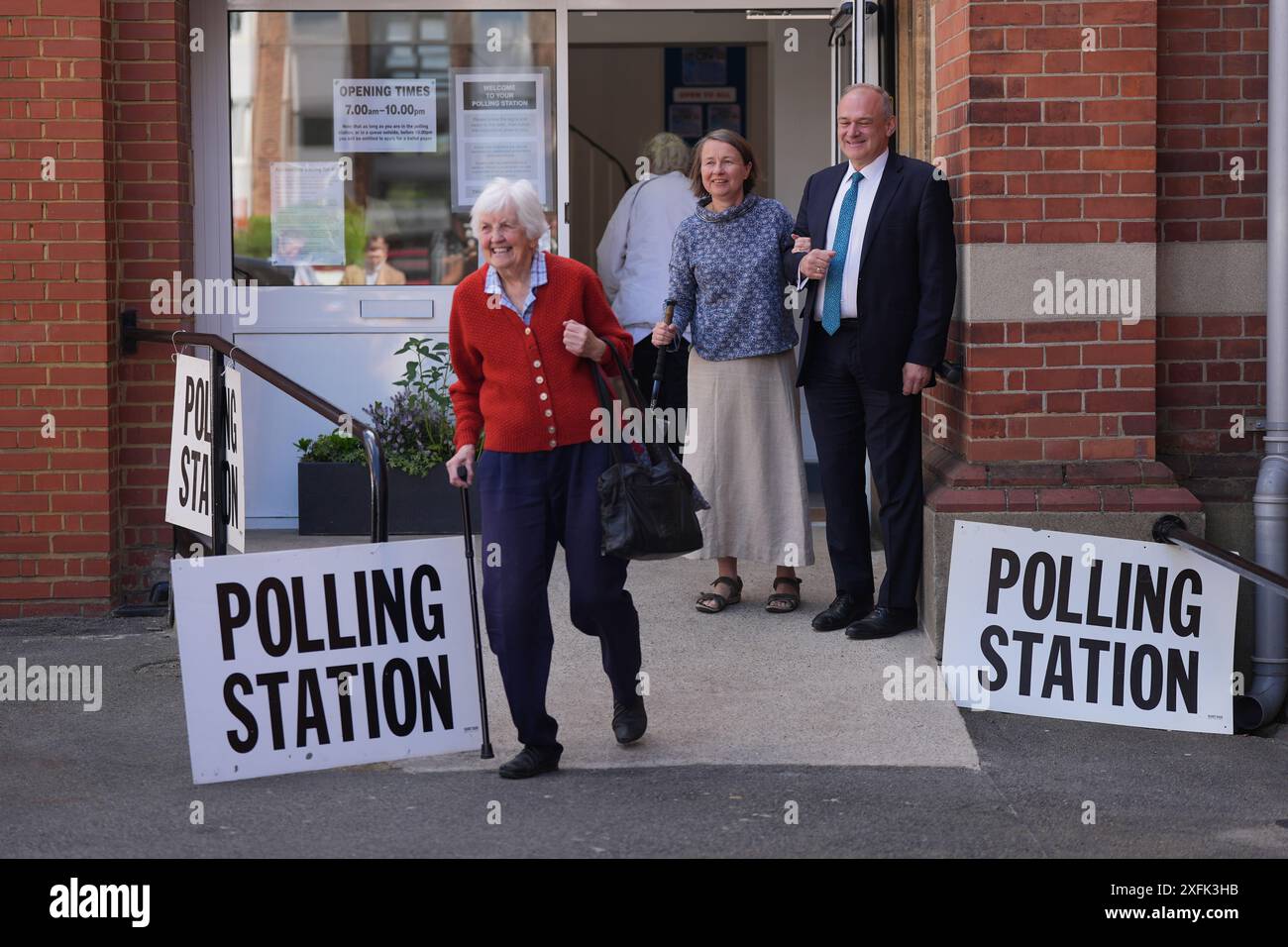 Liberal Democrat leader Sir Ed Davey and his wife Emily Gasson leave ...