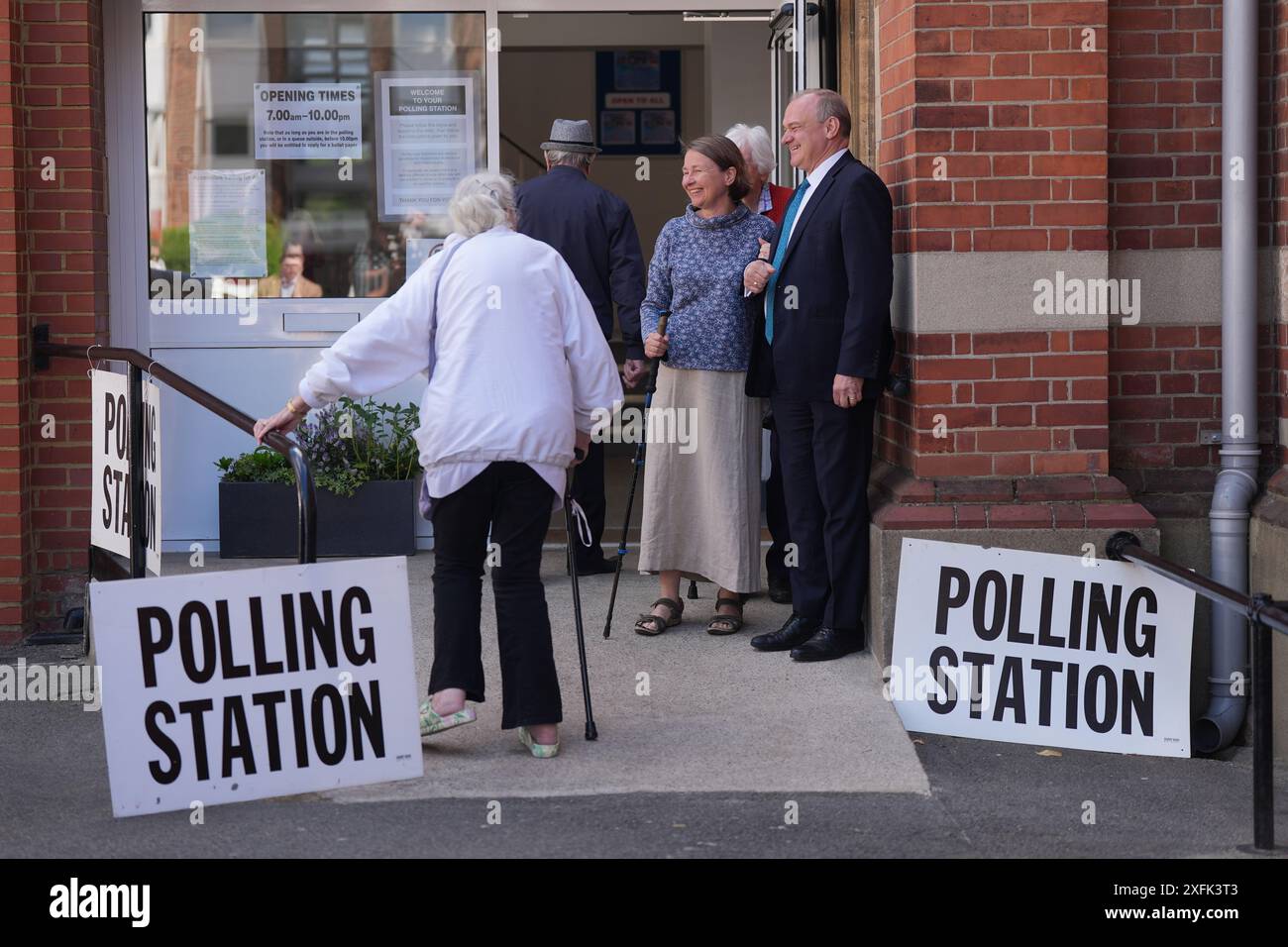 Liberal Democrat leader Sir Ed Davey and his wife Emily Gasson leave ...