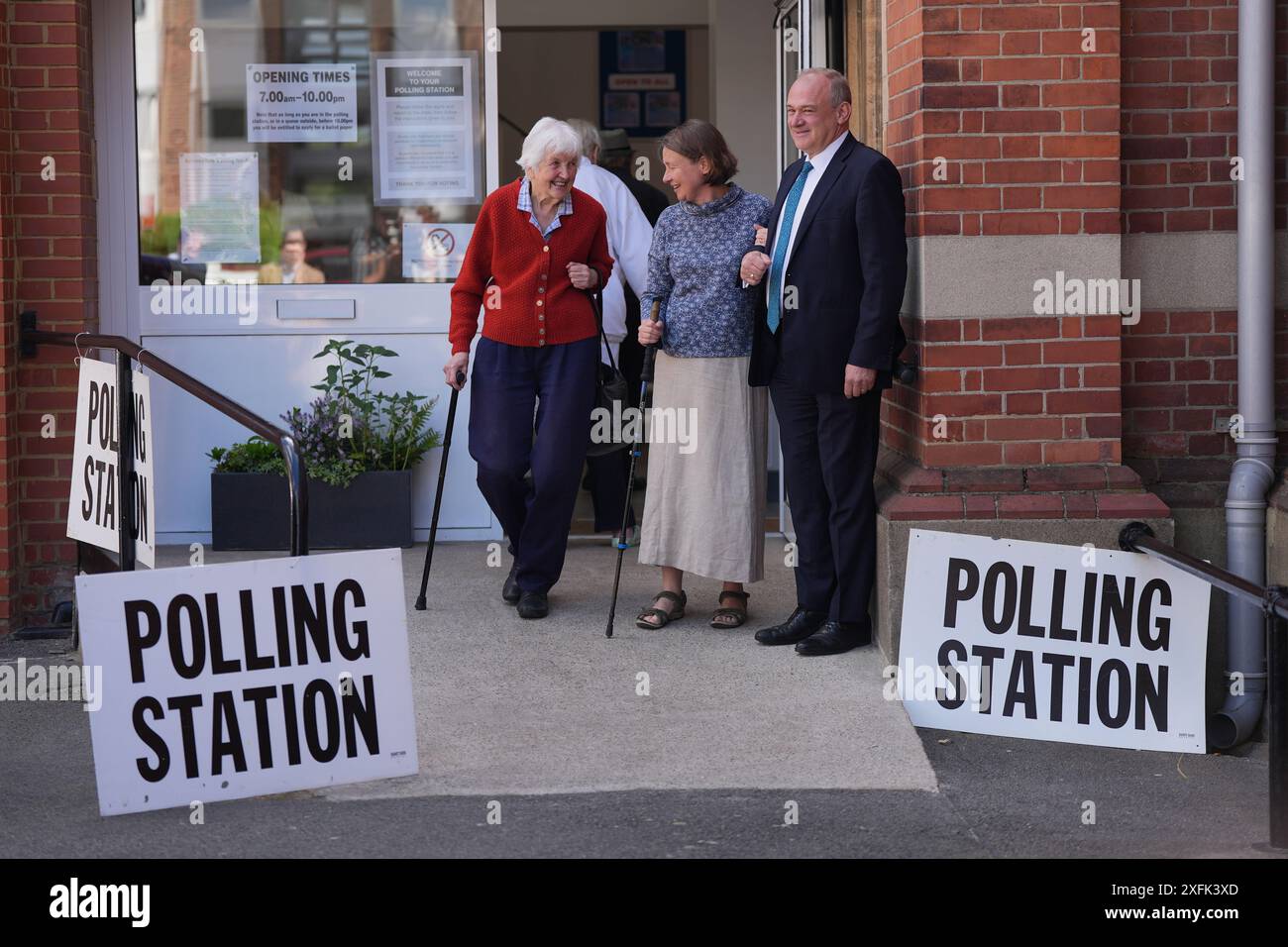Liberal Democrat leader Sir Ed Davey and his wife Emily Gasson leave ...