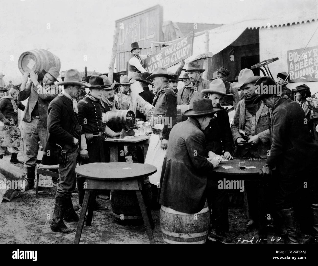 JAMES MARCUS as Judge Haller opens his combination bar in THE IRON ...
