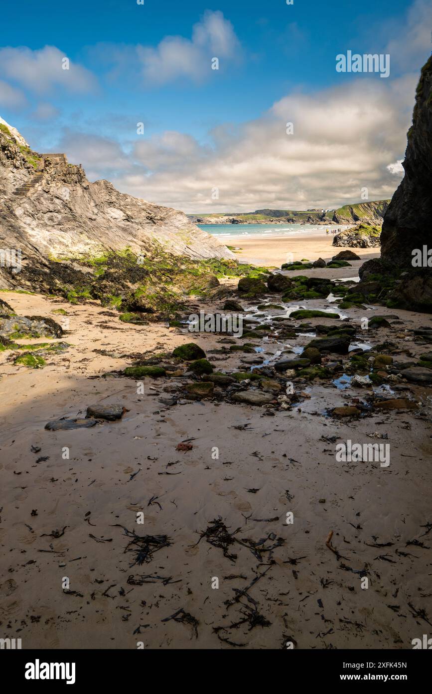 The rugged rocks below cliffs on Great Western Gt Western beach in ...