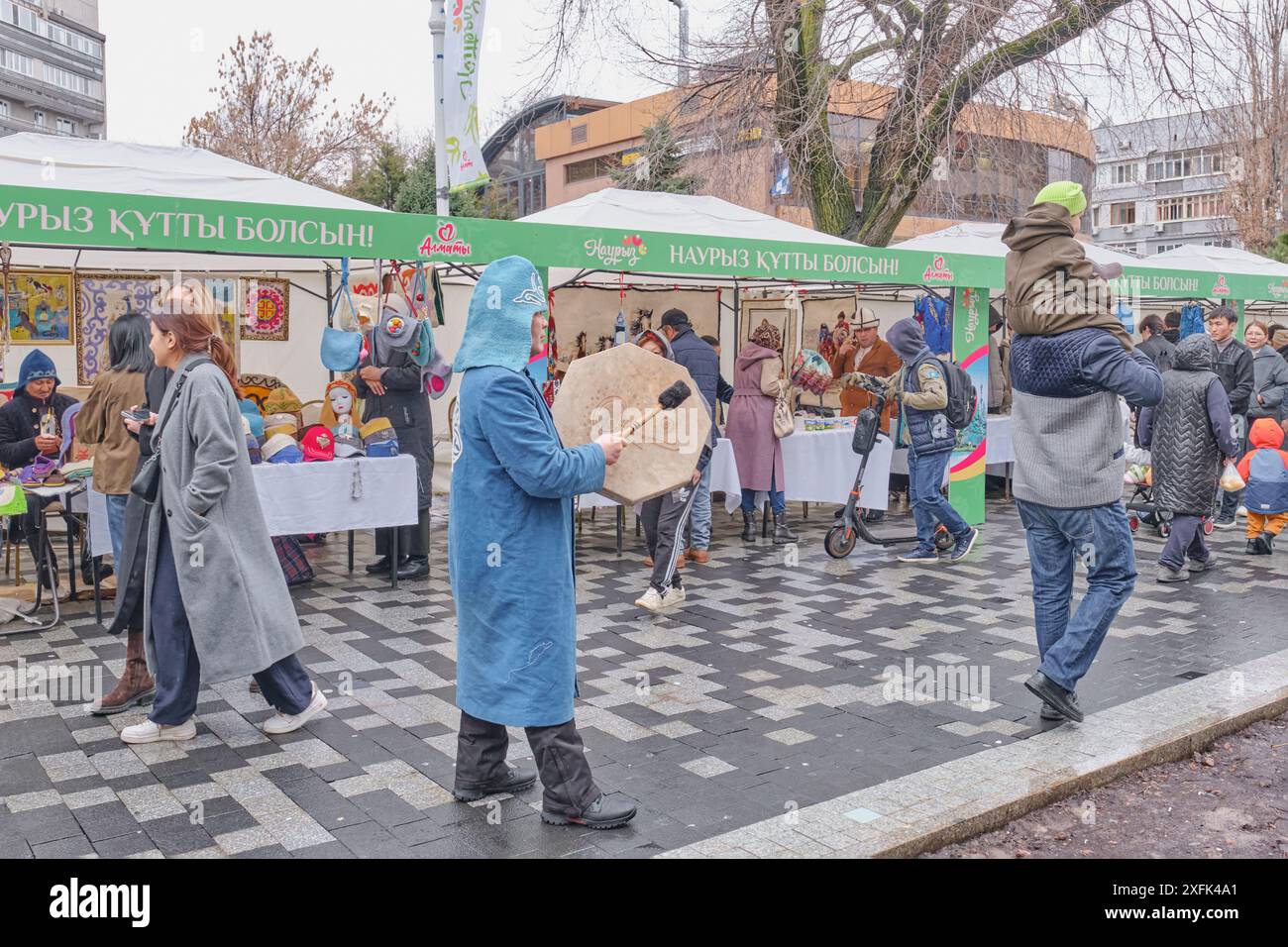 Almaty, Kazakhstan - March 20, 2024: People walking at crafts fair ...