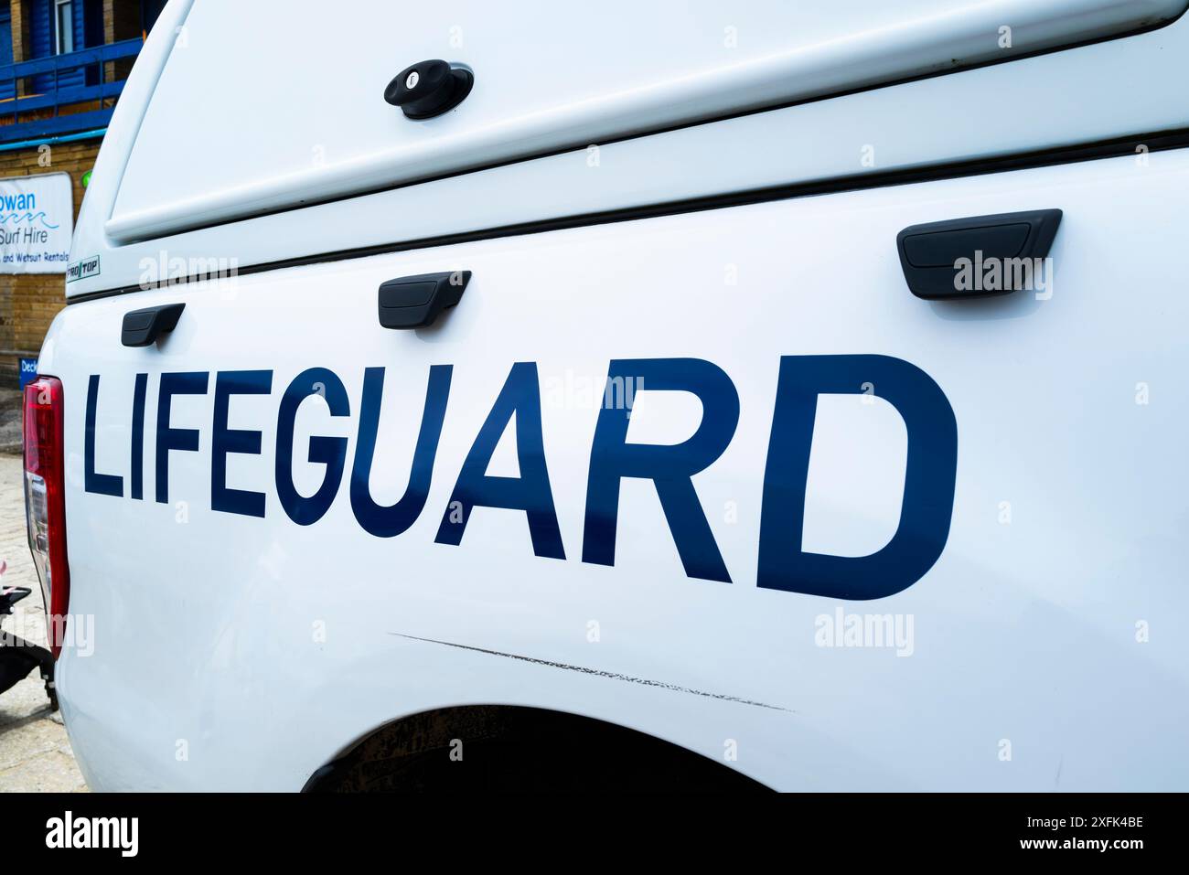 The word Lifeguard on the side of a RNLI emergency response vehicle ...