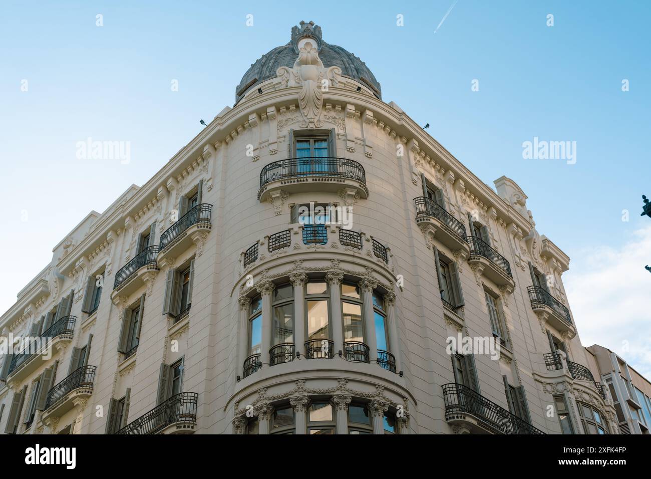 Historic building featuring a domed roof and ornate balconies. The ...