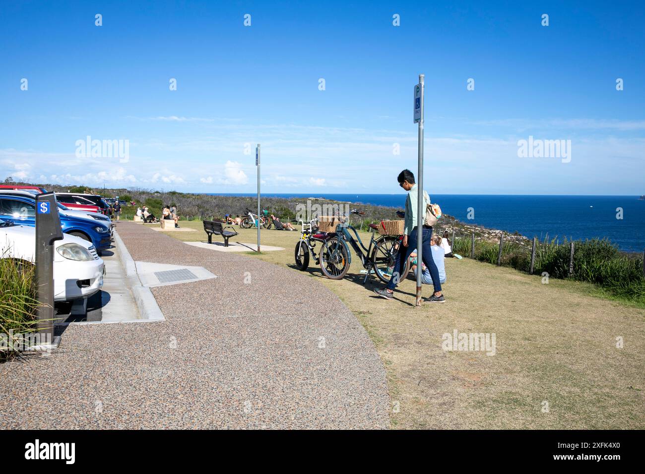 Cyclists at North Head Manly in Sydney harbour national park enjoying ...
