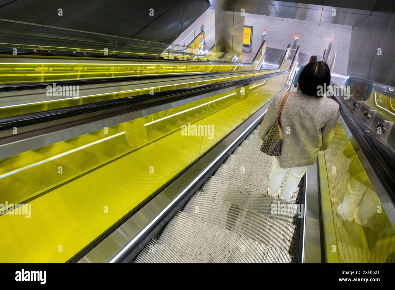 London Underground escalators at Canary Wharf Elizabeth Line station on ...