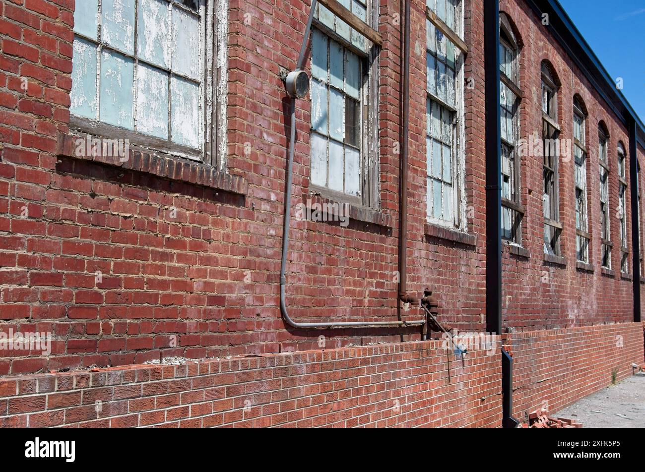 Exterior wall of an old industrial building Stock Photo - Alamy
