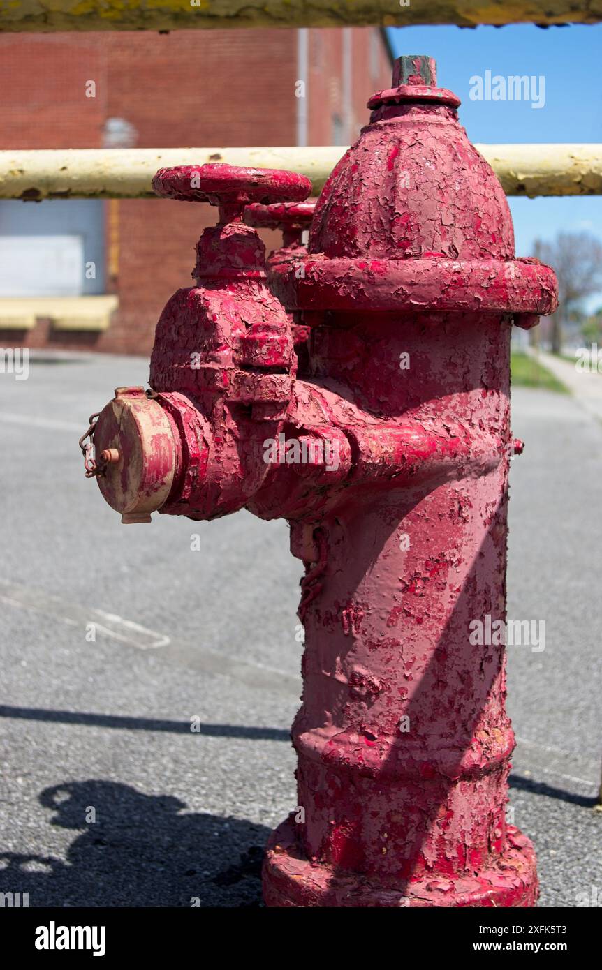 Old red fire hydrant in need of new paint Stock Photo - Alamy