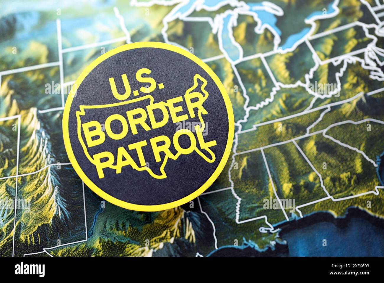 KYIV, UKRAINE - JUNE 26, 2024 U.S. Border Patrol coat of arms on paper ...