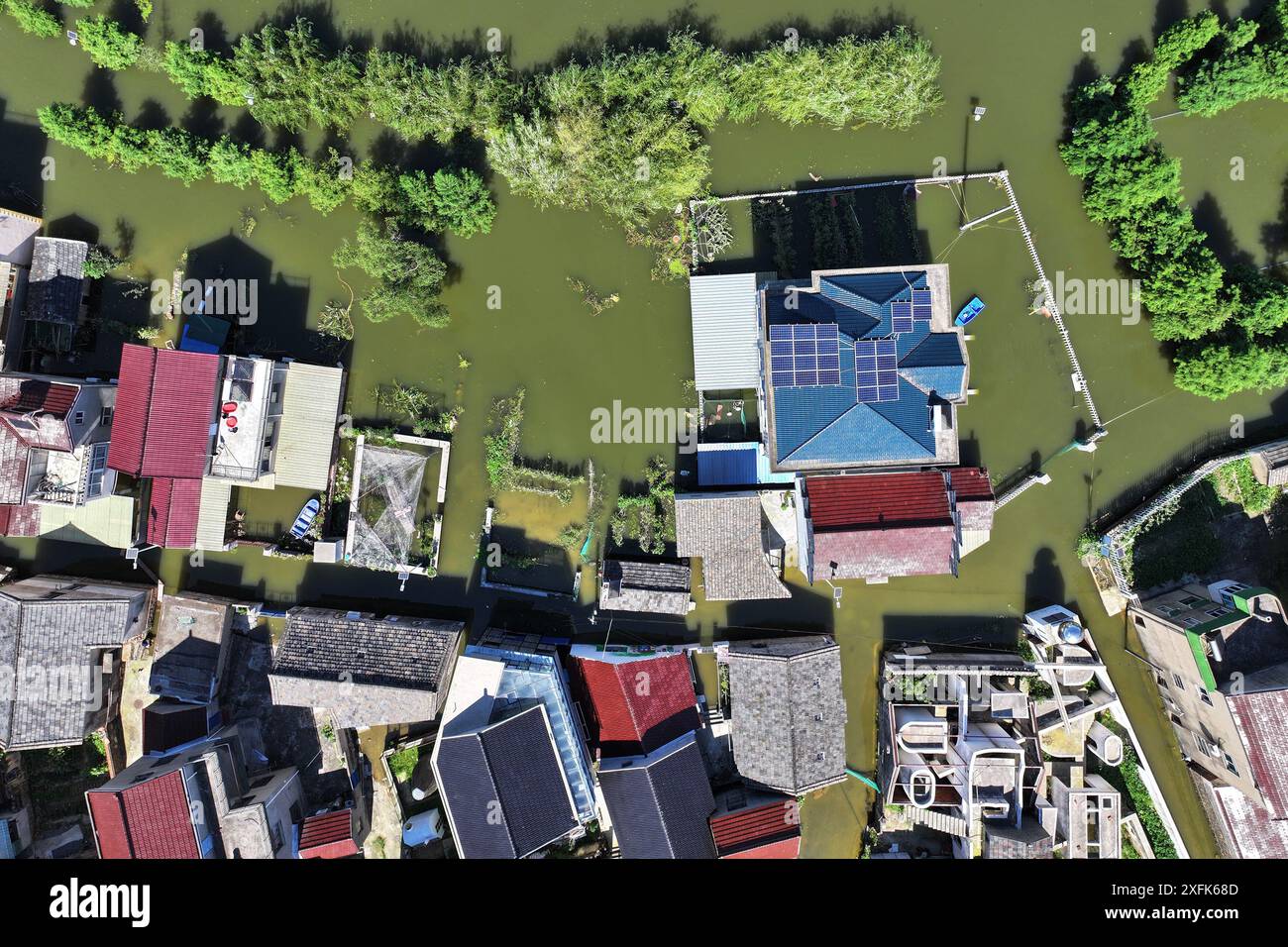 NANJING, CHINA - JULY 4, 2024 - The water level of Shijiu Lake rises after days of rainstorm and ...
