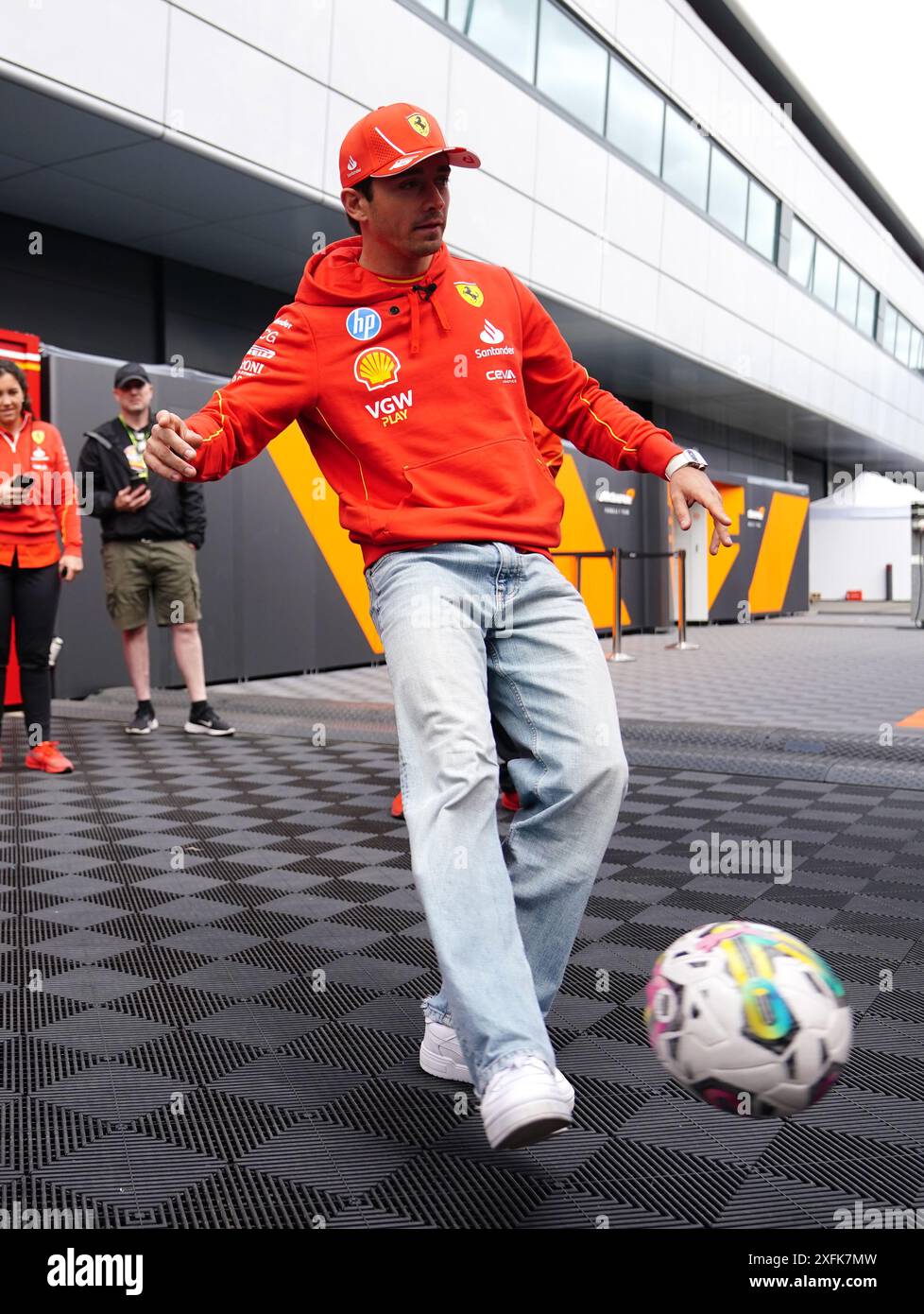 Ferrari's Charles Leclerc playing with a football at Silverstone ...