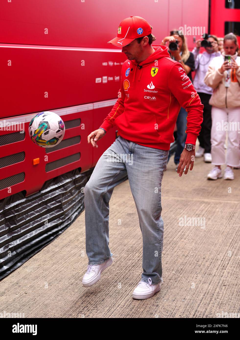 Ferrari's Charles Leclerc playing with a football at Silverstone ...