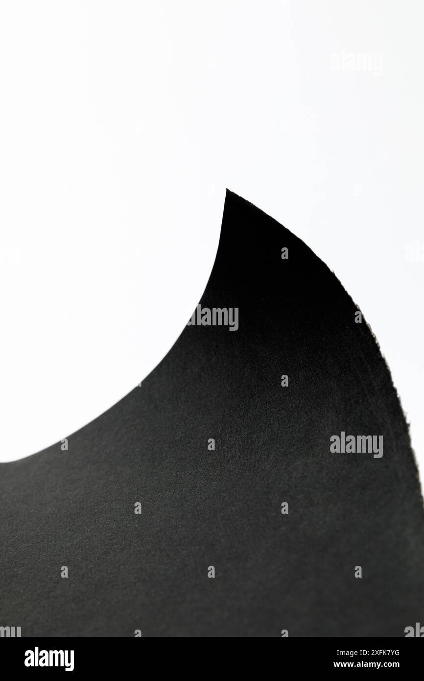 Smooth Black Paper Edge in a White Background, Embracing Geometric ...