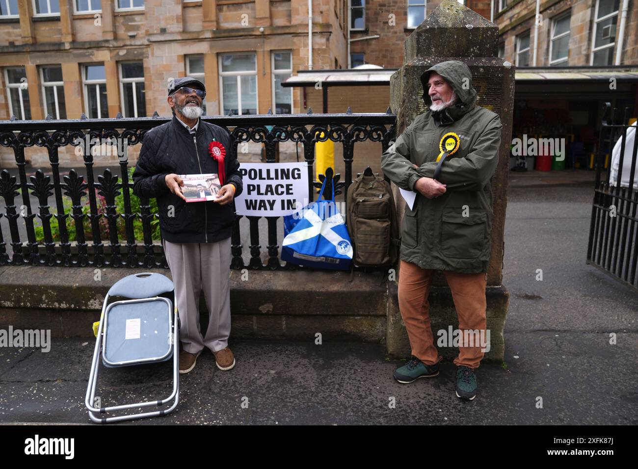 Labour and SNP supporters outside a polling station at Pollokshields ...