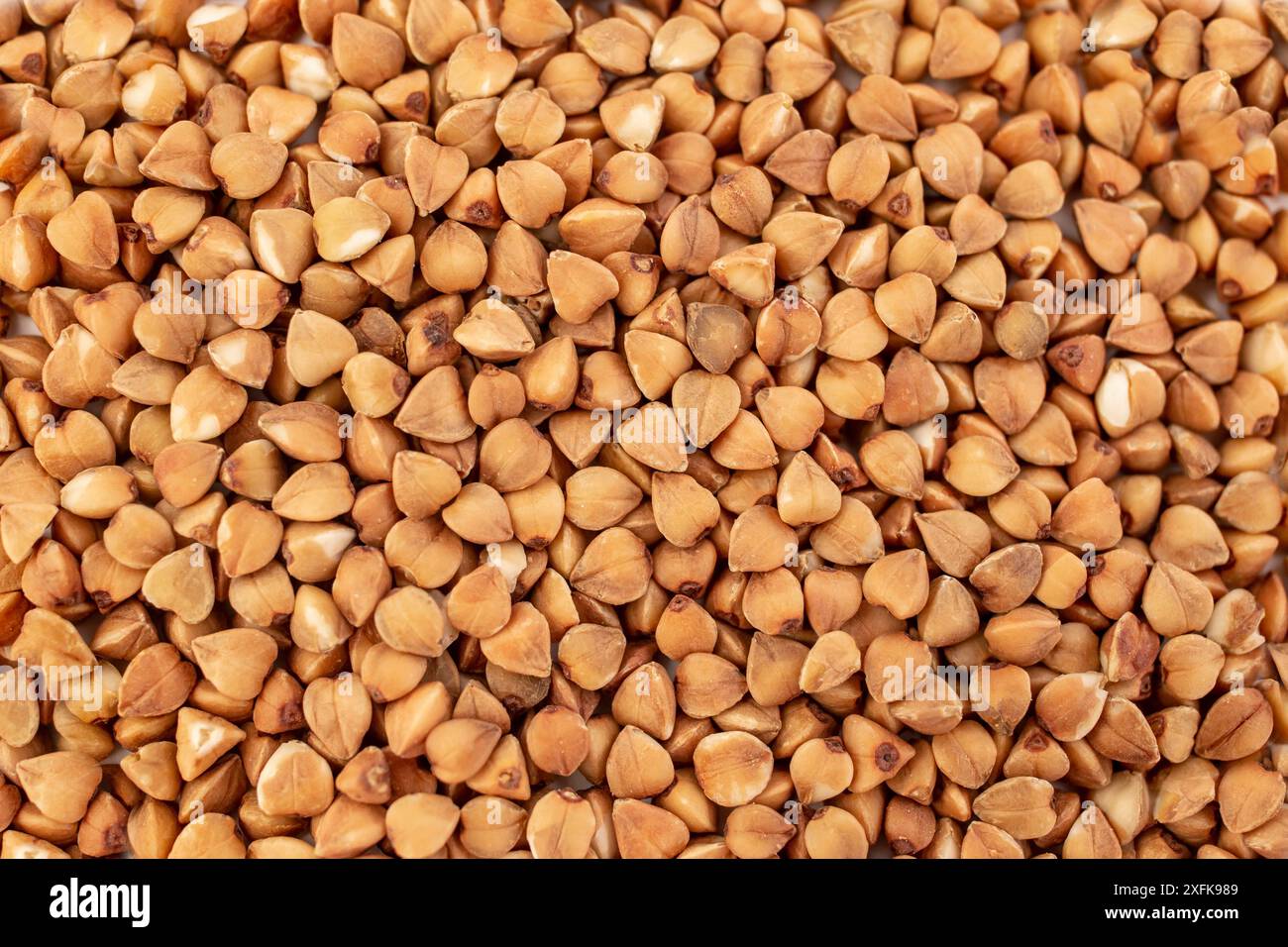 Buckwheat seeds full frame texture, healthy food backdrop, close up ...