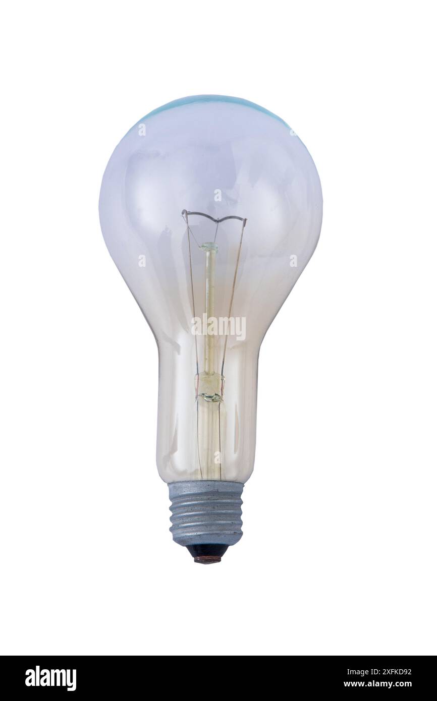 An old glass light bulb with a tungsten filament isolated on white ...