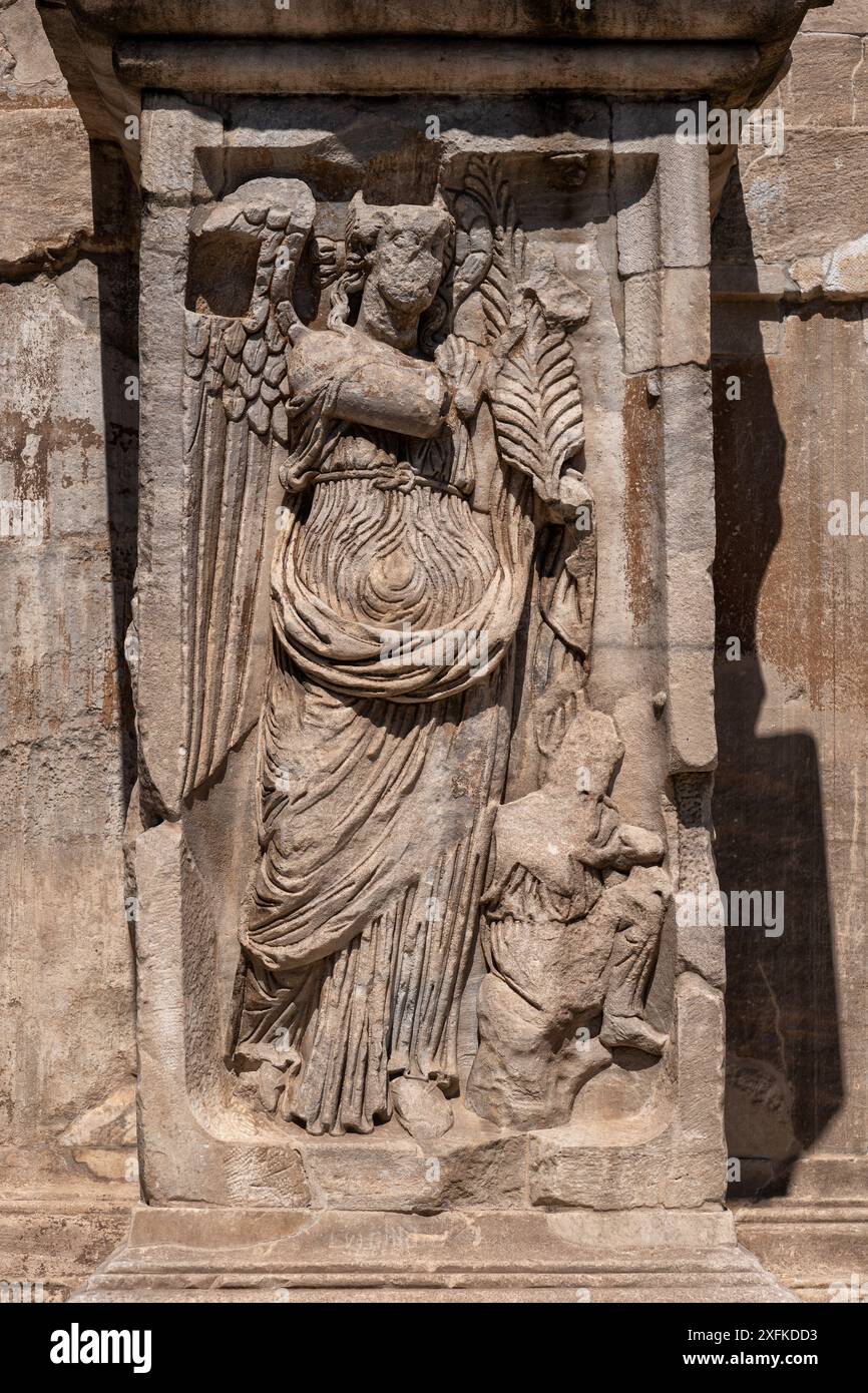Ancient relief of Victoria, winged goddess of victory on Arch of ...
