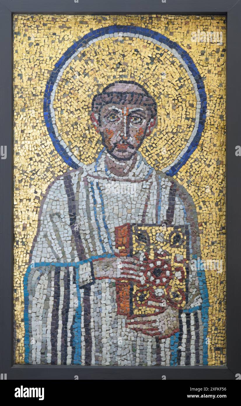 Early Christian mosaic depicting a saint with the Gospel in his hands ...