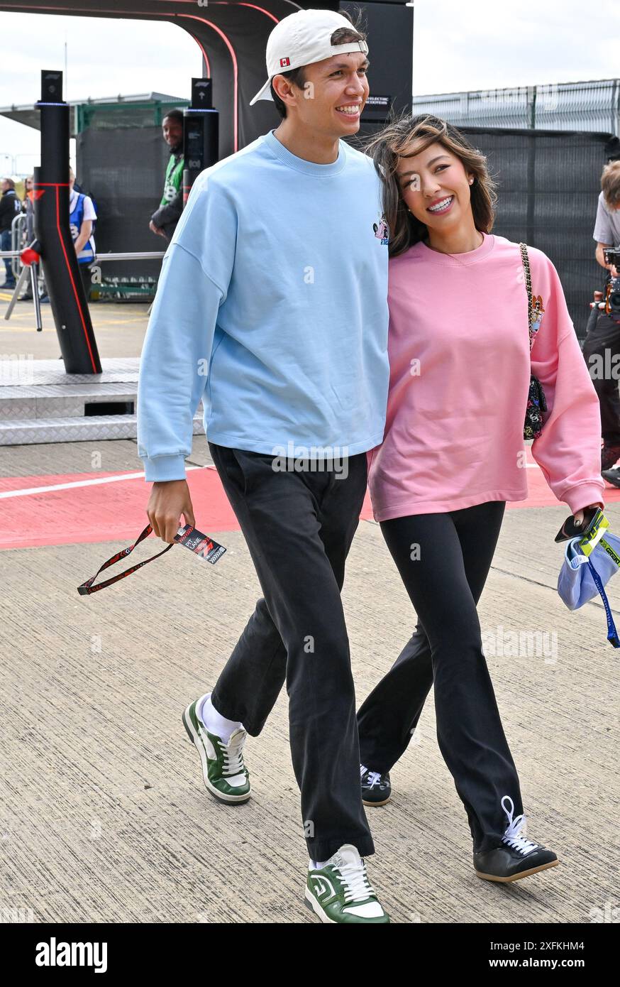 Towcester, UK, 04 July 2024. Alex Albon arrives with his girlfriend ...