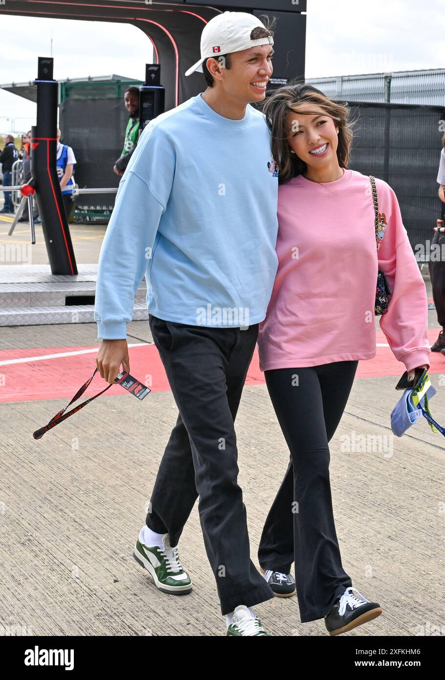 Towcester, UK. 04th July, 2024. Alex Albon arrives with his girlfriend ...