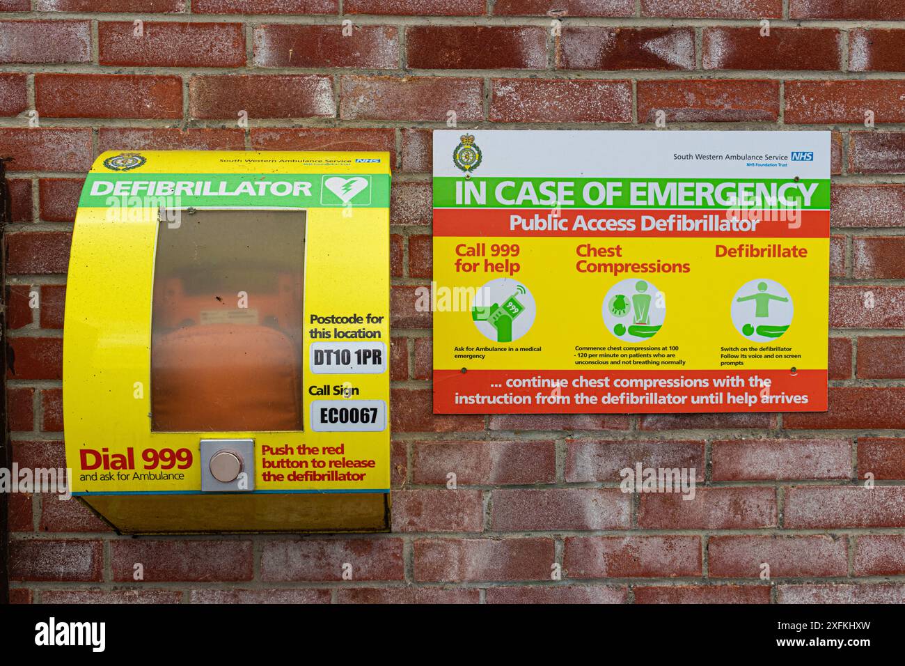 Public access defibrillator mounted on the village hall wall in ...