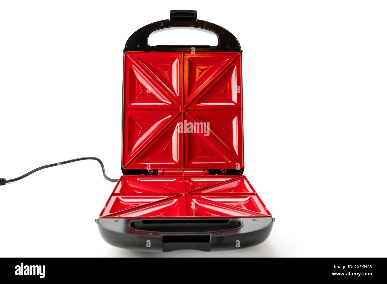 The red and black toaster is open and ready to use. Electric sandwich ...