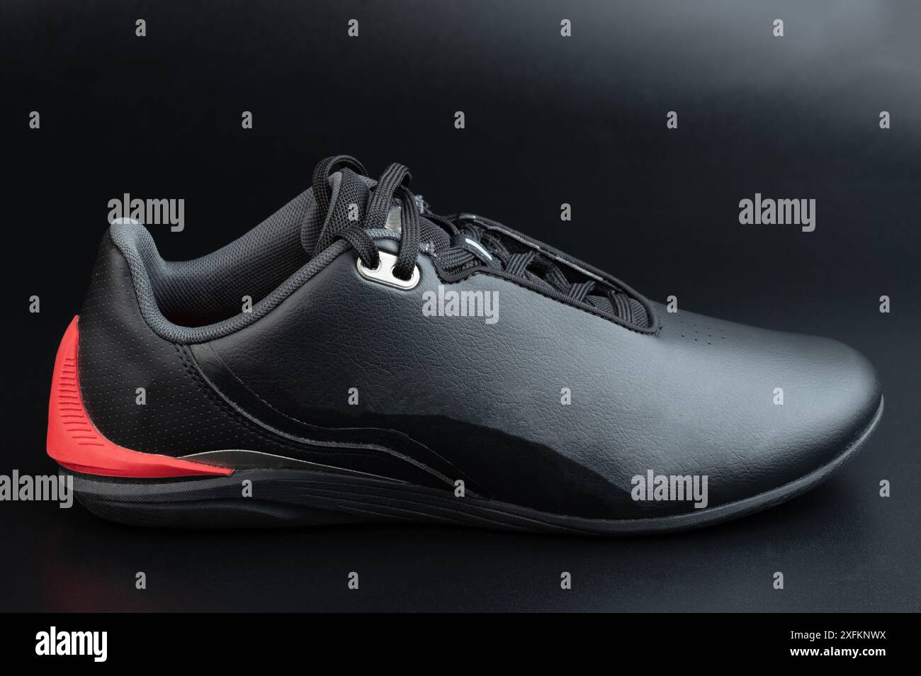 One black leather shoe with lace side view on studio background Stock ...