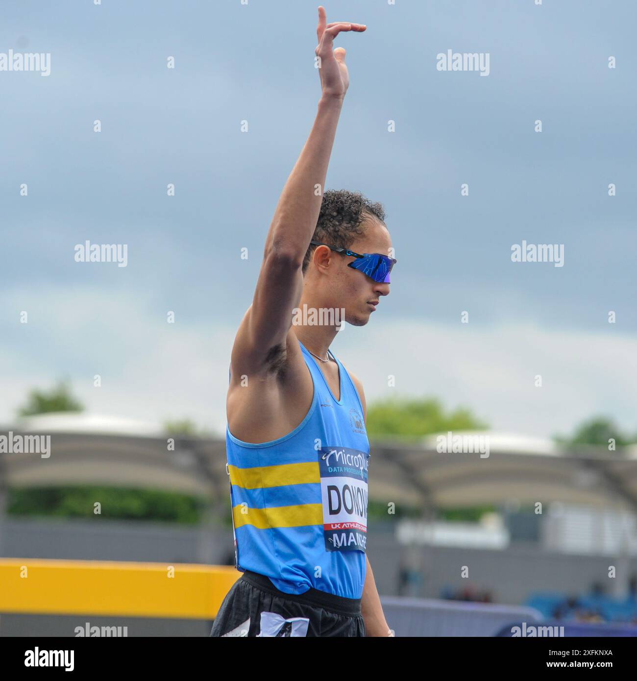 Tyri Donovan points to the sky ahead of heat 2 of the 400m hurdles ( / SPP Stock Photo - Alamy