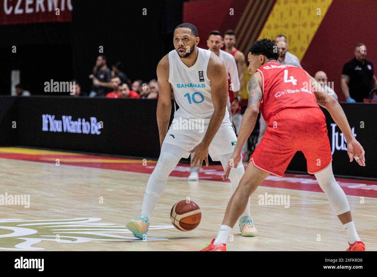 Eric Gordon (L) of Bahamas and A.J. Slaughter (R) of Poland in action ...