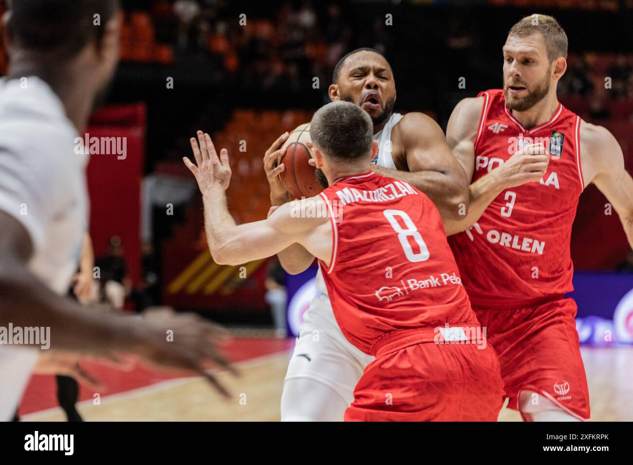 Eric Gordon (L) of Bahamas and Andrzej Mazurczak (R) of Poland in ...