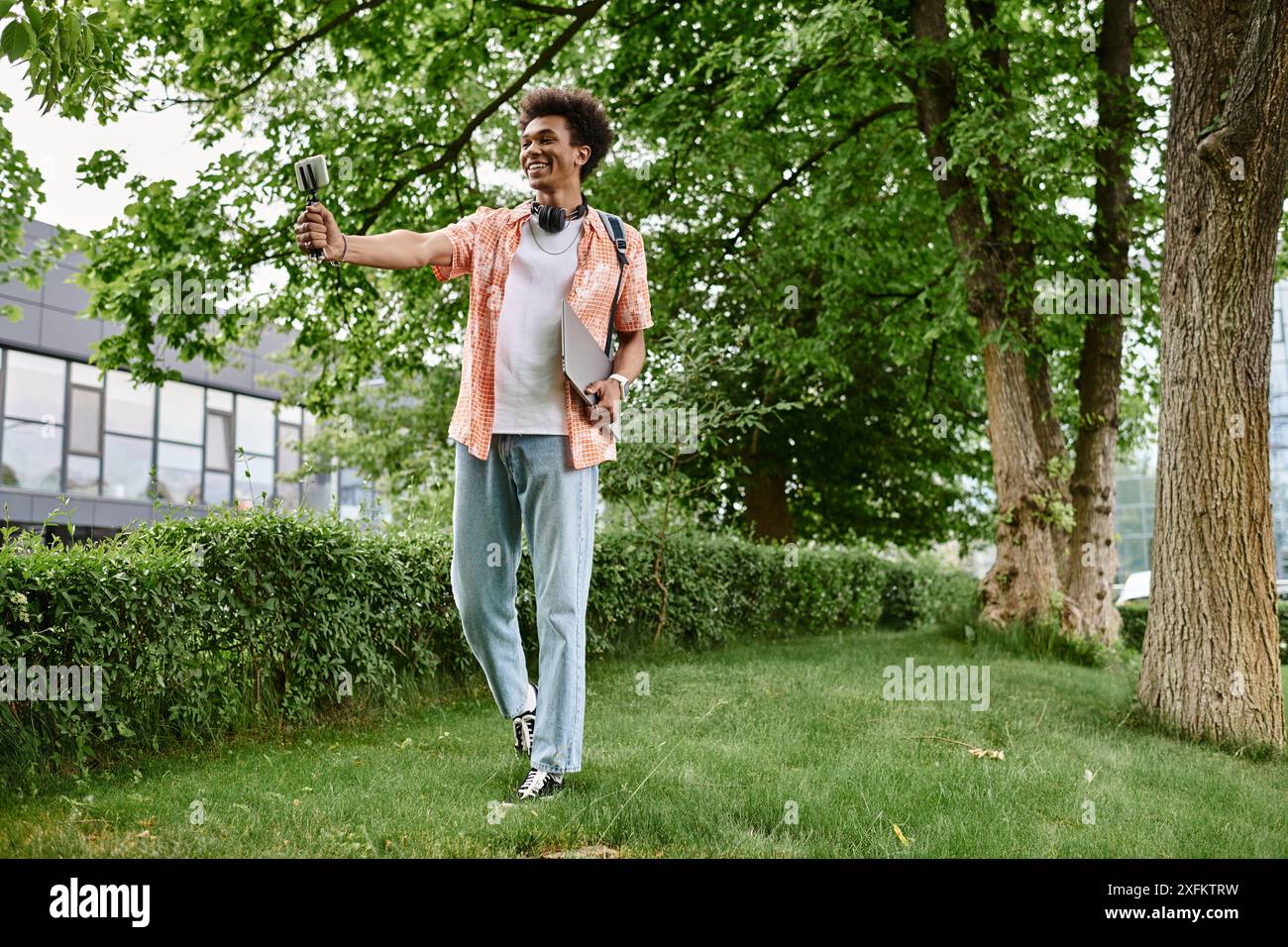 African man capturing moment hi-res stock photography and images - Alamy