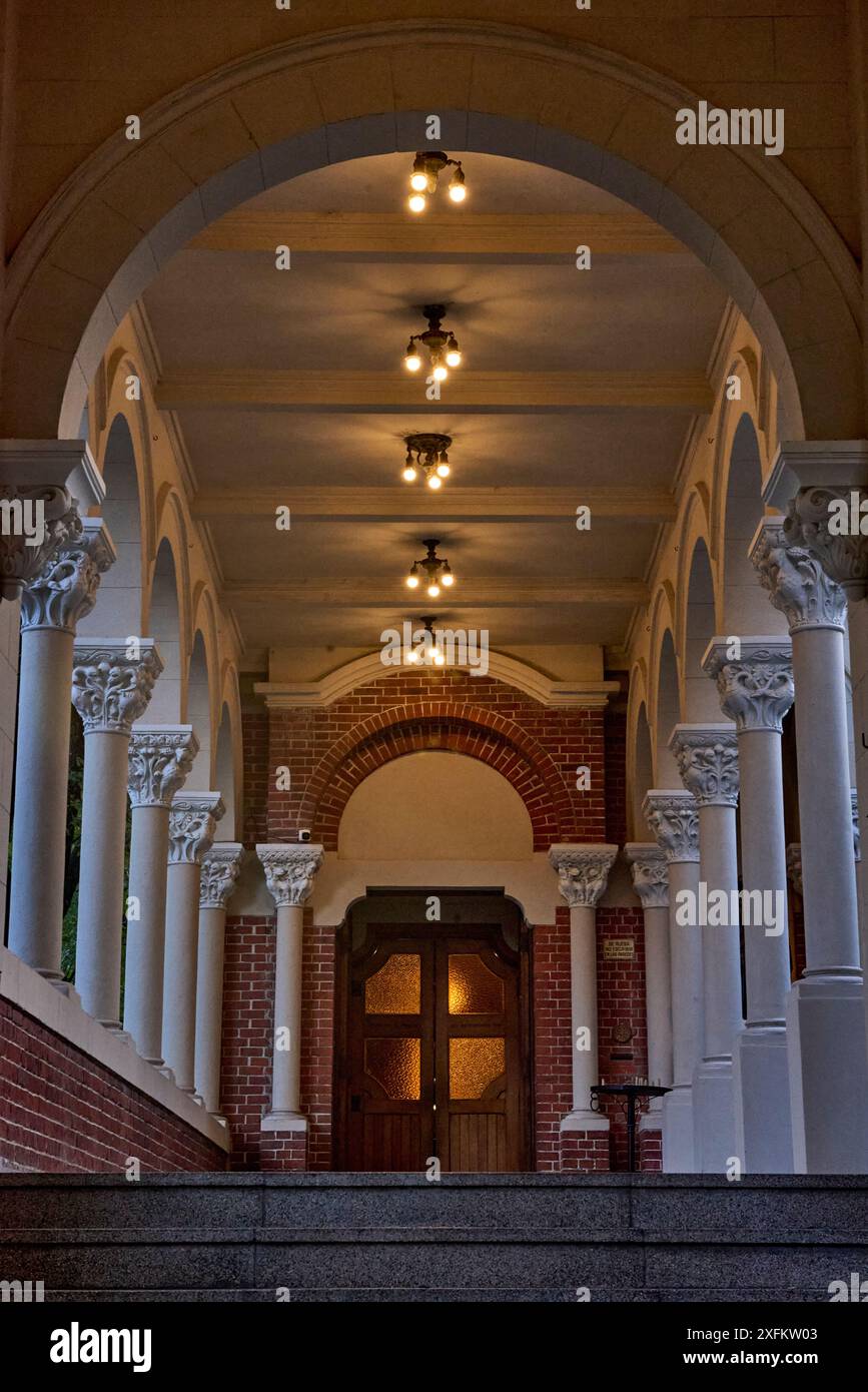 Church Entrance. Arcade with columns at both sides, with Corinthian ...