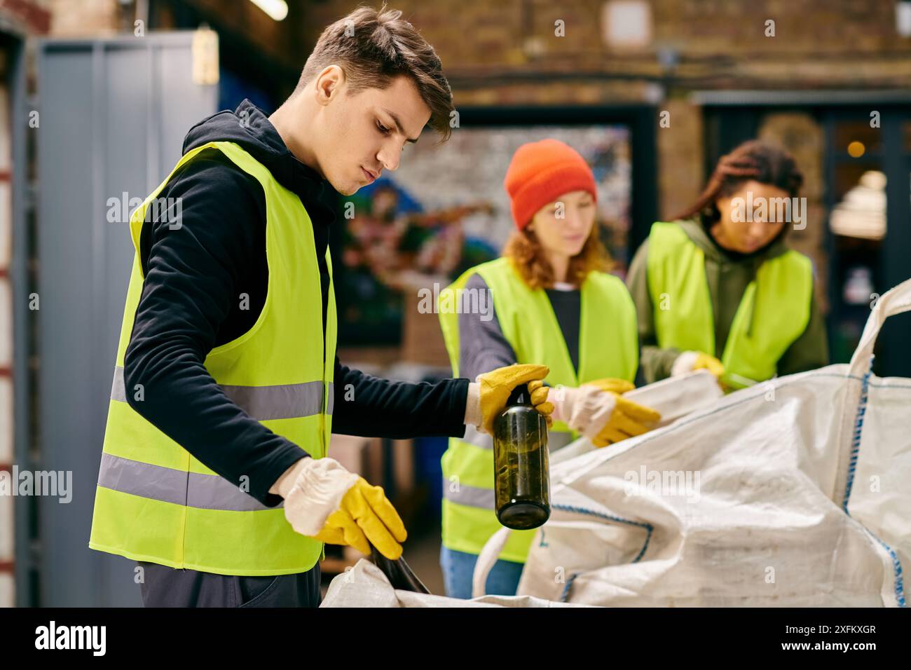 A group of eco-conscious young volunteers in yellow vests and gloves ...