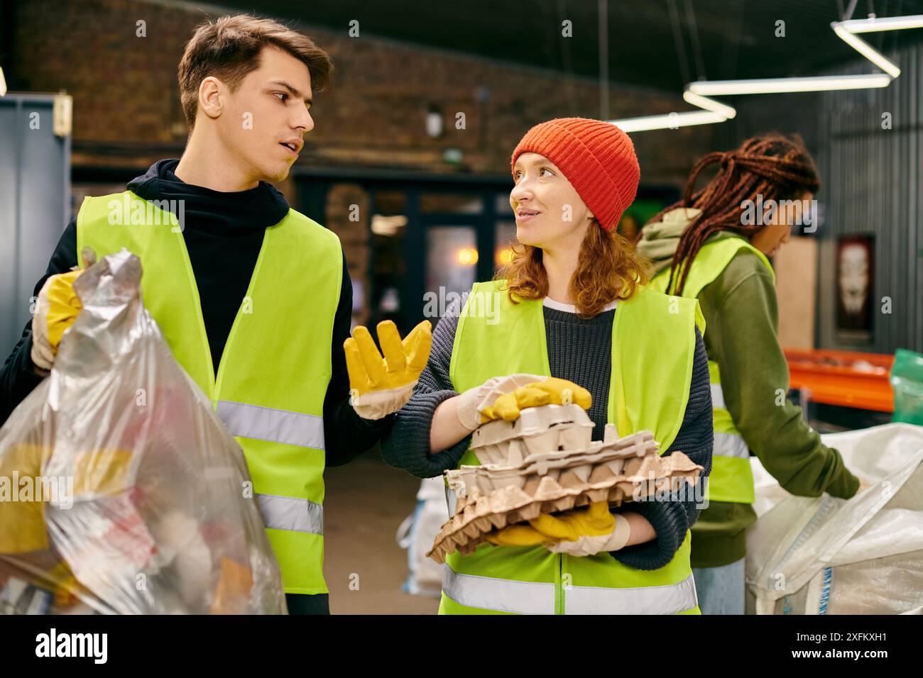 eco-conscious people, in gloves and safety vests, stand together ...