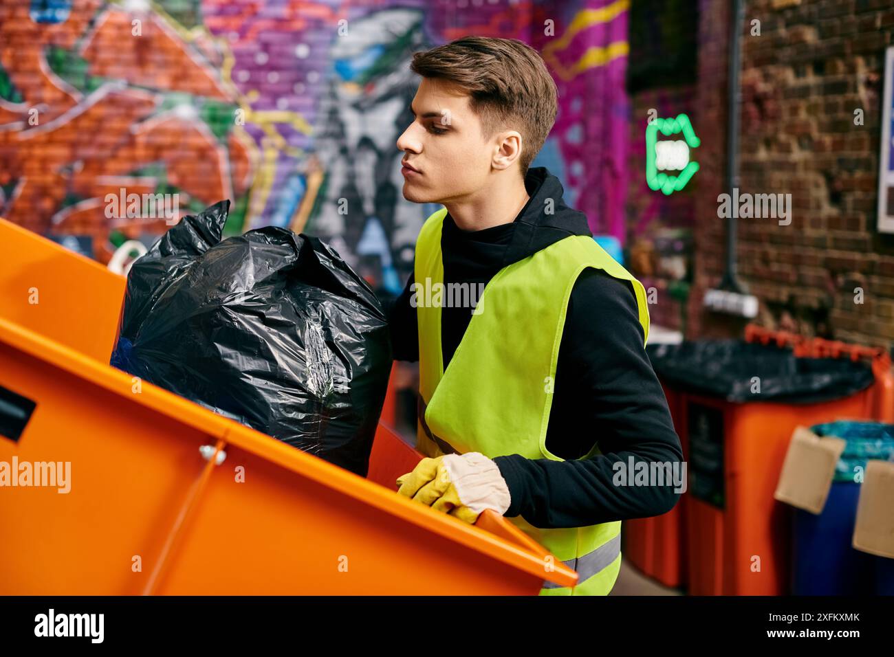 Man in volunteer vest hi-res stock photography and images - Alamy