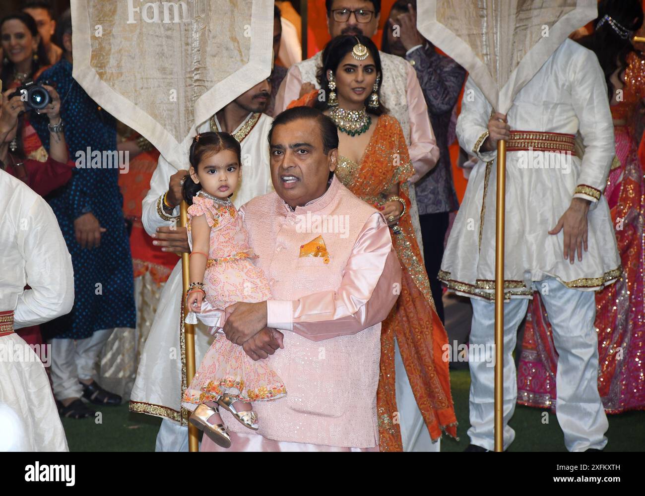 Indian businessman Mukesh Ambani poses for a photo with granddaughter ...