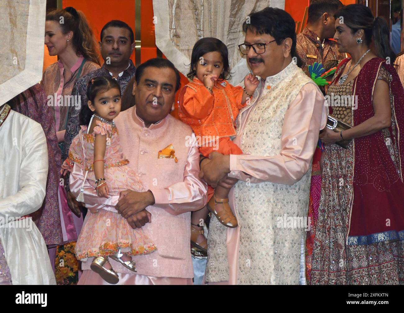 (L-R) Indian businessman Mukesh Ambani and Ajay Piramal pose for a ...