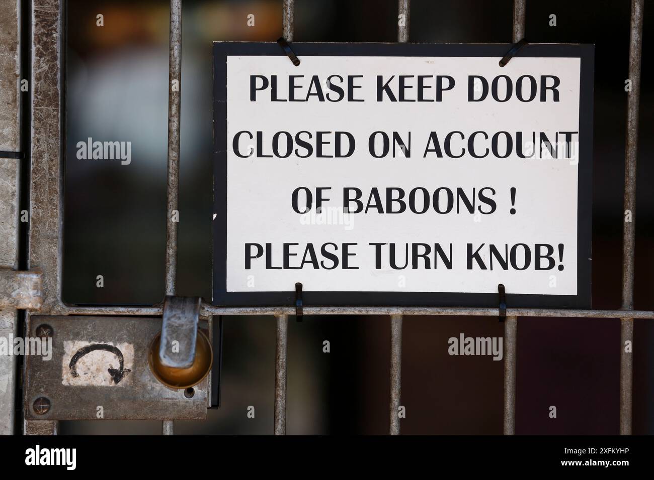 Sign 'Please keep door closed on account of Baboons' warning against ...