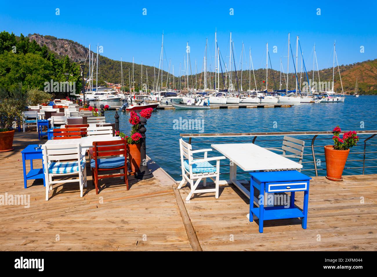 Greek style street cafe at the Fethiye port. Fethiye is a city in Mugla ...