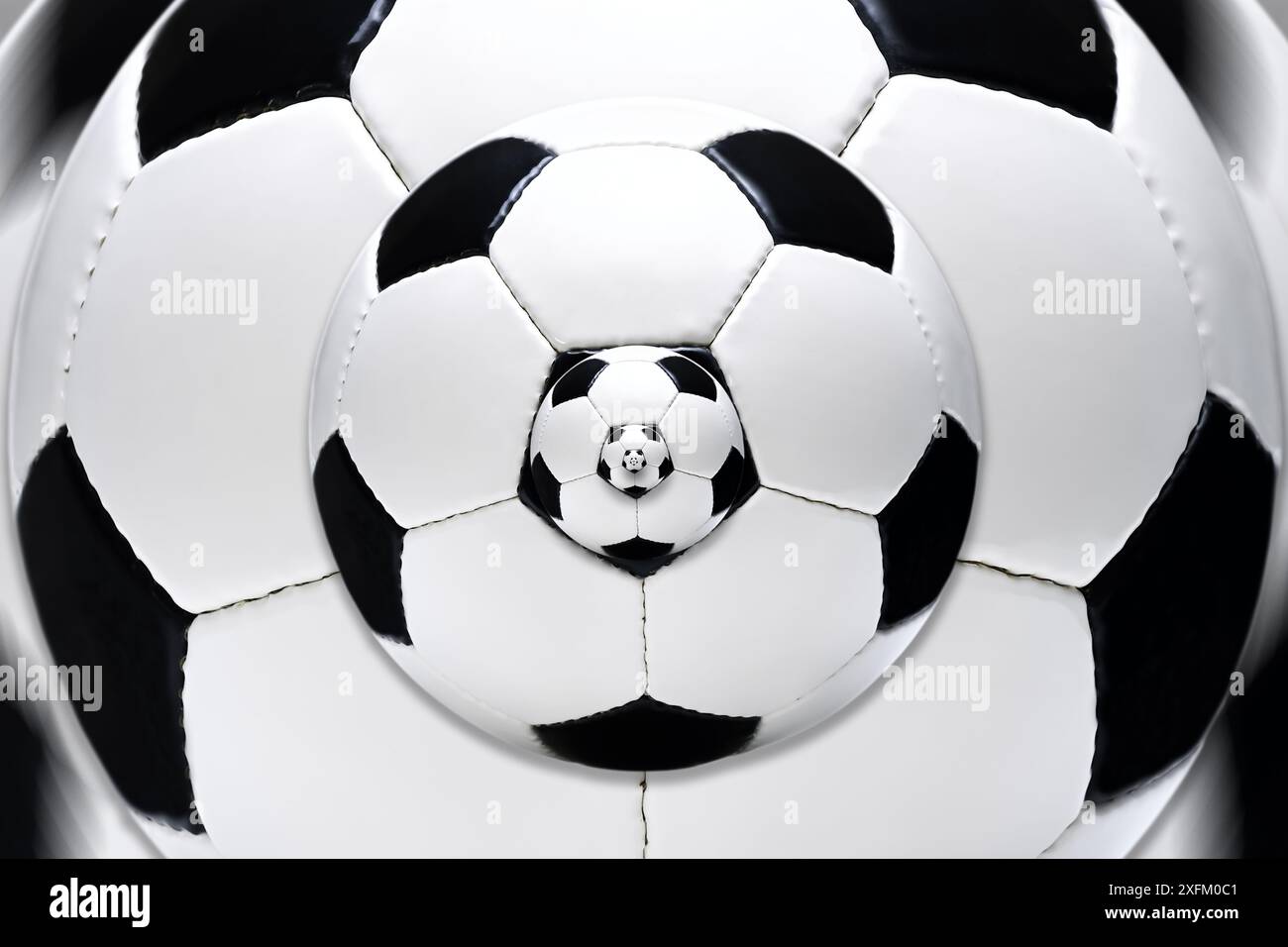 Photo collage of a black and white football Stock Photo - Alamy