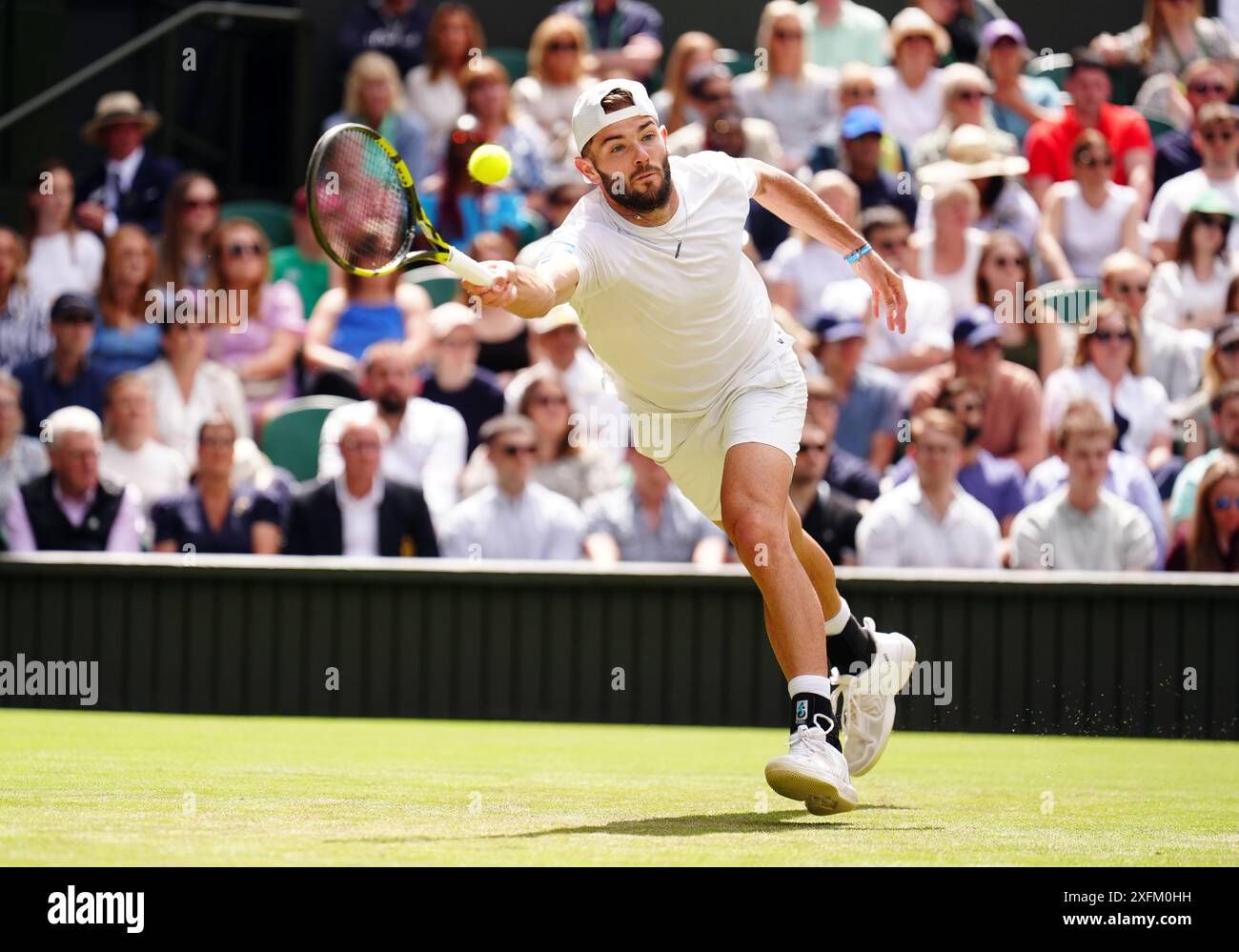 Jacob Fearnley in action against Novak Djokovic (not pictured)on day ...