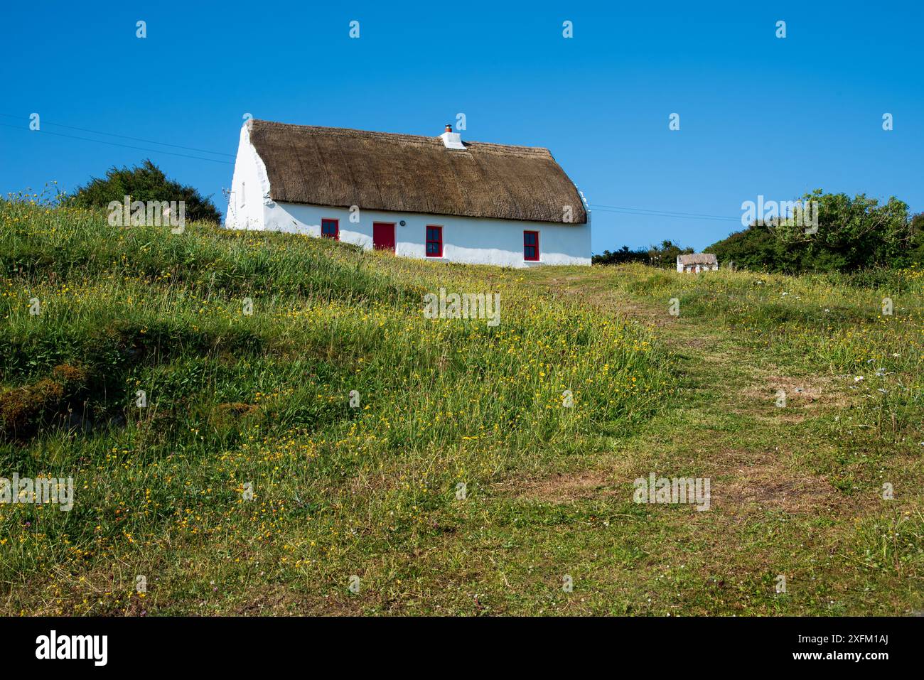 Irish cottage with thatched roof on Irishmore, Aran island, Ireland ...