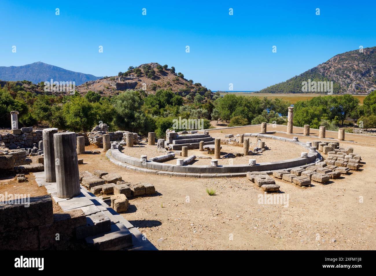 The temple terrace and the round structure ruins at the Kaunos ancient ...