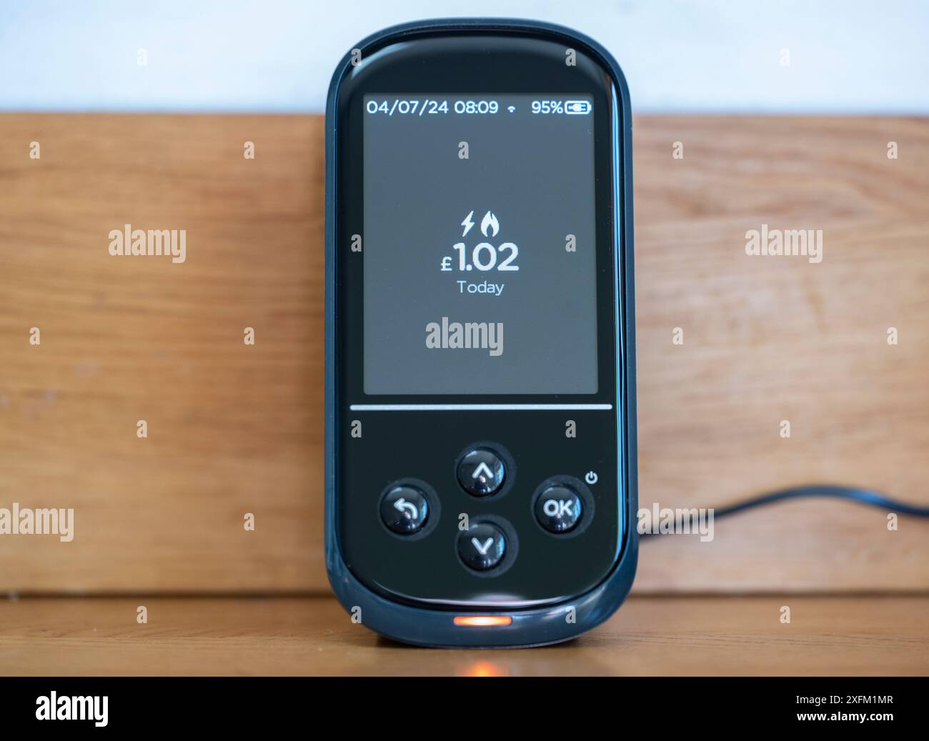 Dual fuel home smart meter in-home display viewer Stock Photo - Alamy