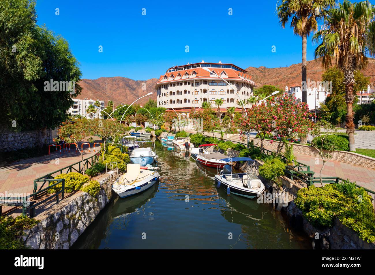Boats on the river canal in Icmeler. Icmeler is a resort town near ...