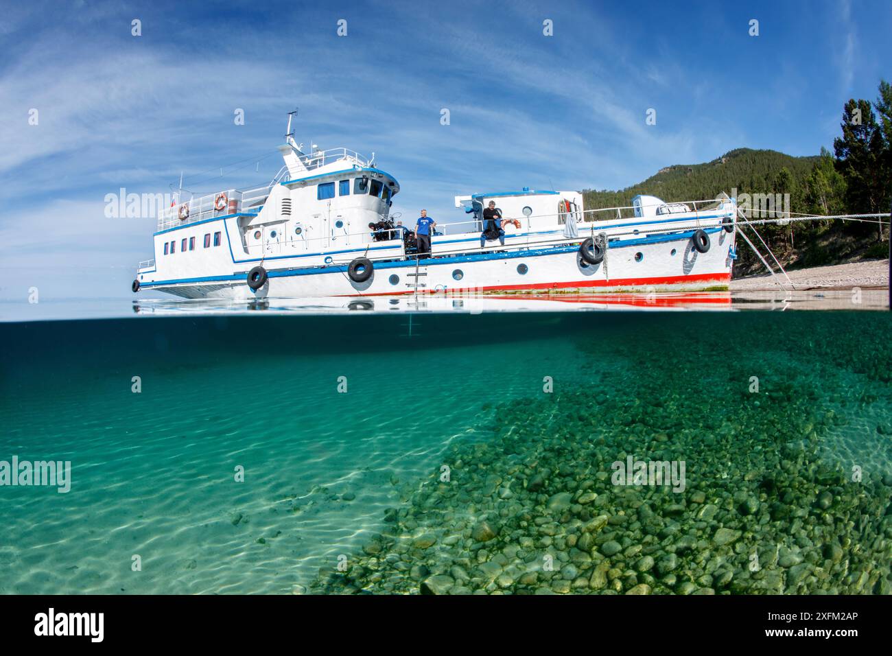 Liveaboard dive boat 'Valeria', anchored at coast of Lake Baikal ...