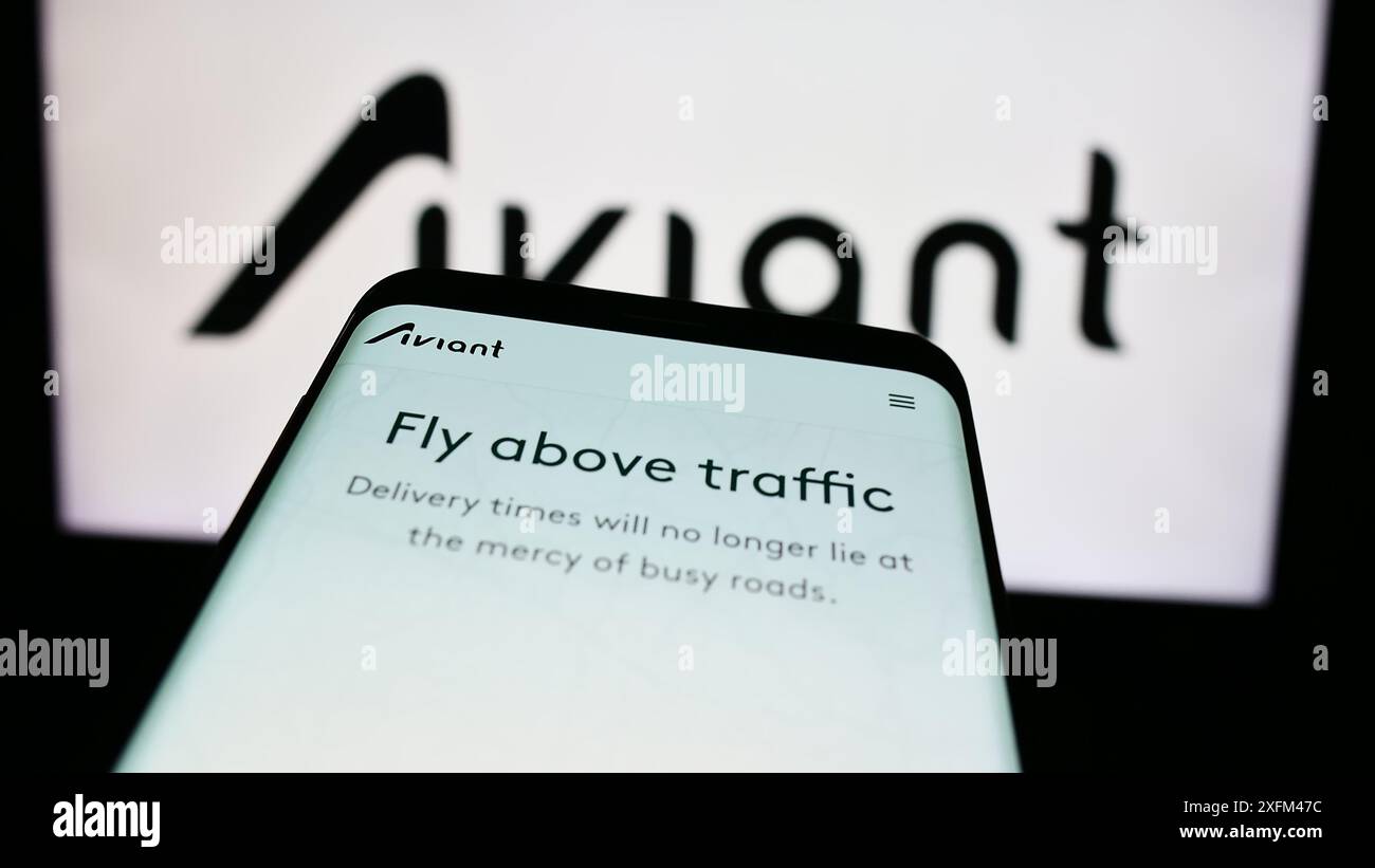 Smartphone with website of Norwegian drone service company Aviant AS in ...
