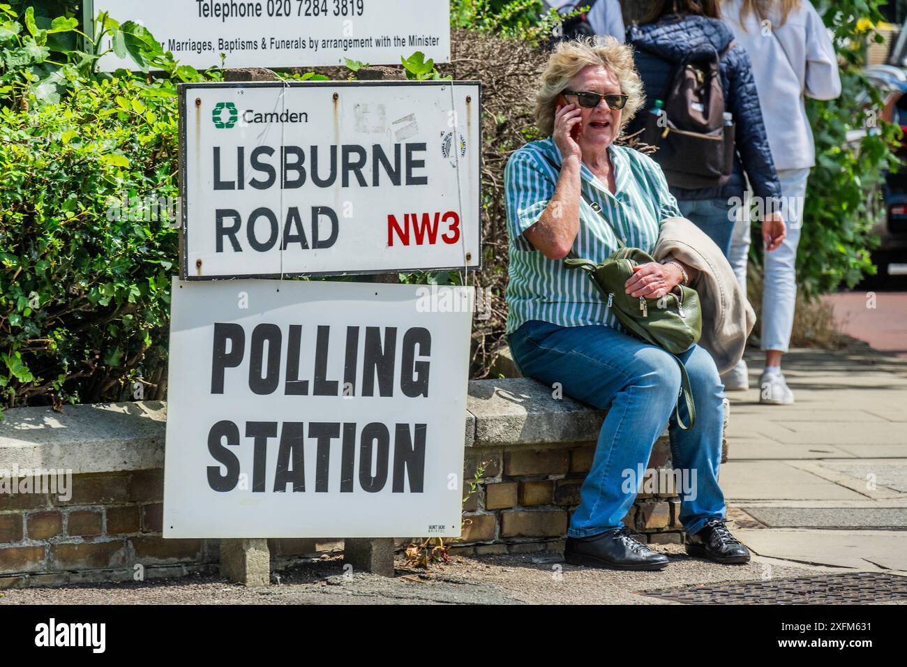 London, UK. 4th July, 2024. Large queues, including people of all ages ...